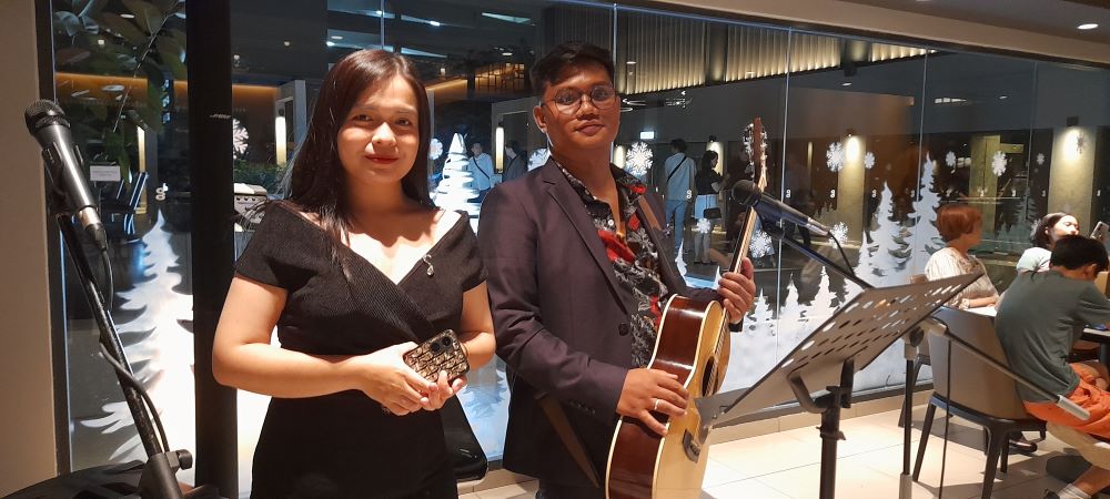 Filipino duo - Soul Vibing performs at the G Hotel